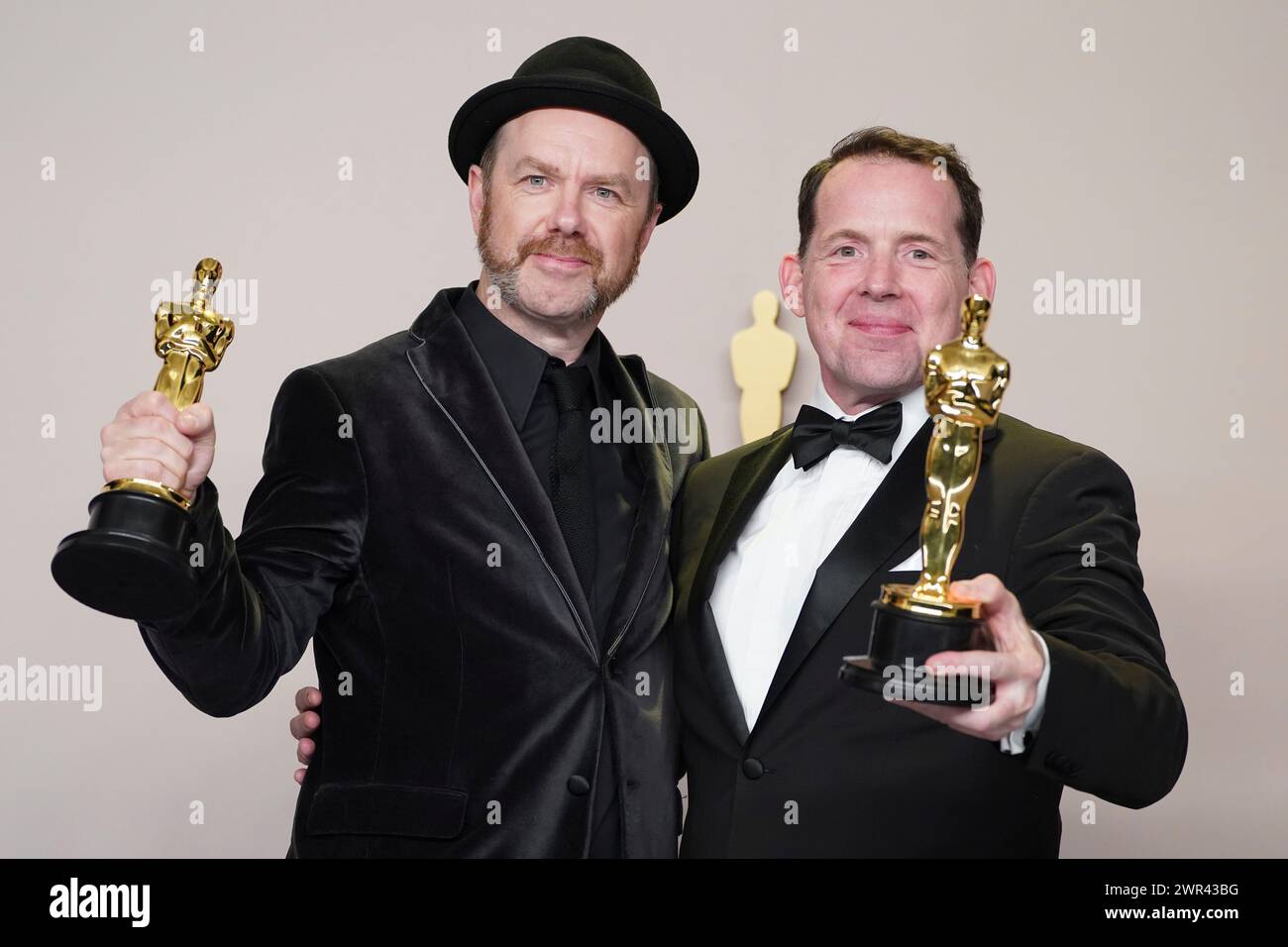 Tarn Willers, left, and Johnnie Burn pose in the press room with the ...