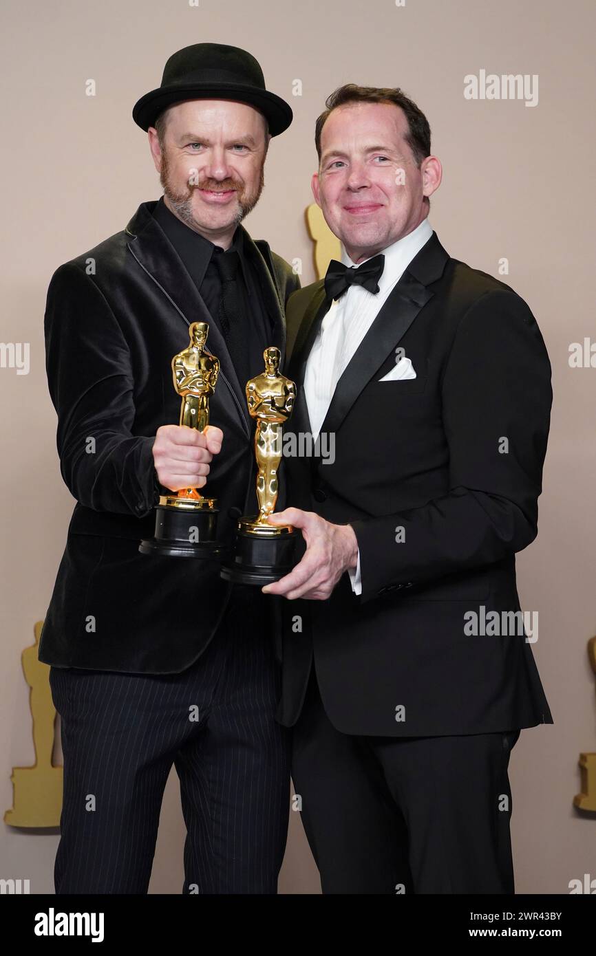 Tarn Willers, left, and Johnnie Burn pose in the press room with the ...
