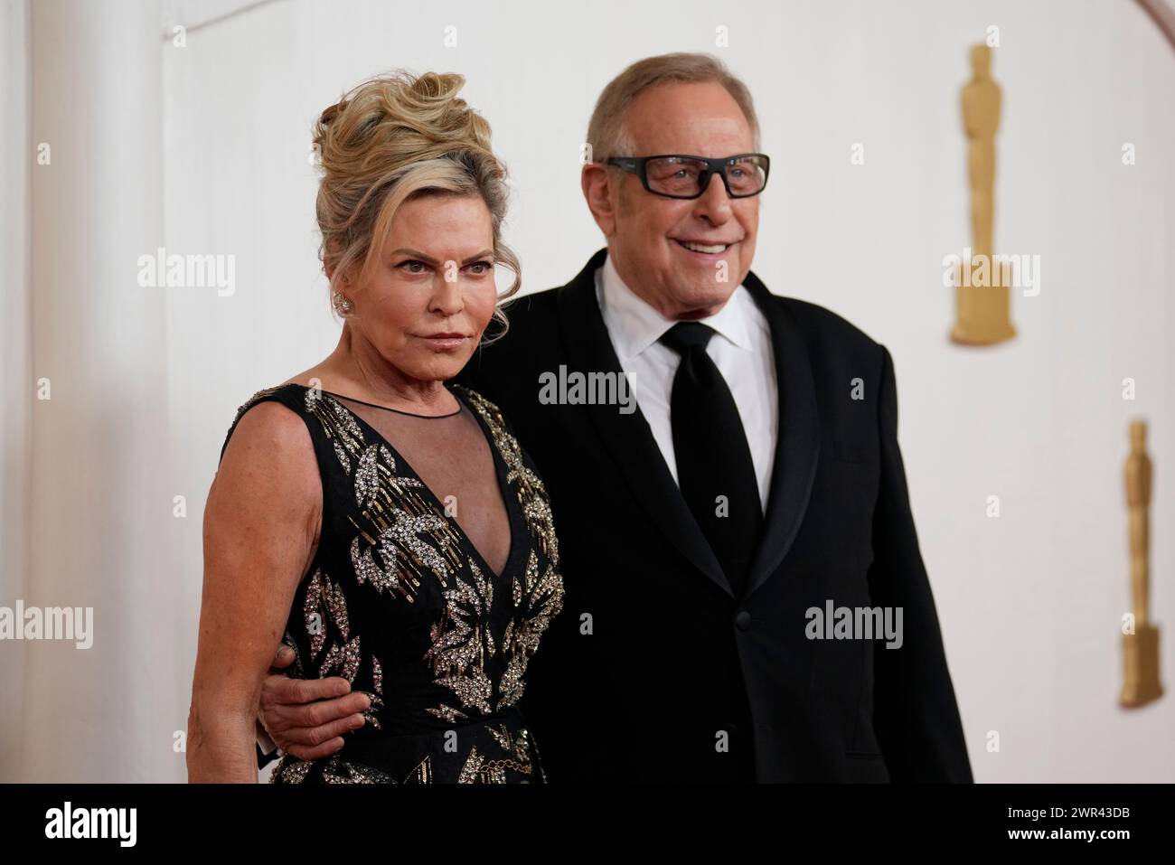 Stephanie Haymes Roven, left,and Charles Roven arrive at the Oscars on ...