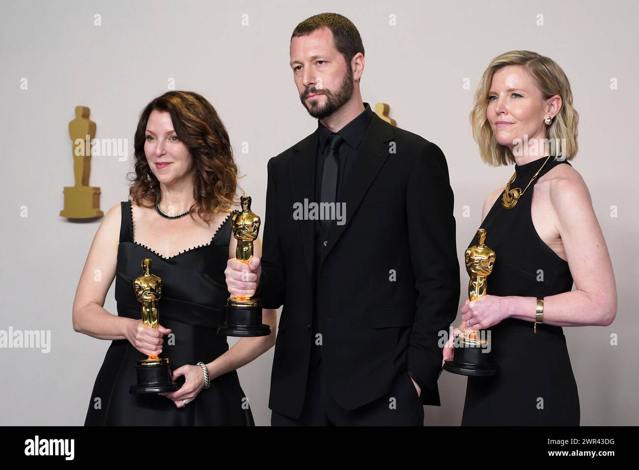 Raney Aronson-Rath, from left, Mstyslav Chernov, and Michelle Mizner ...