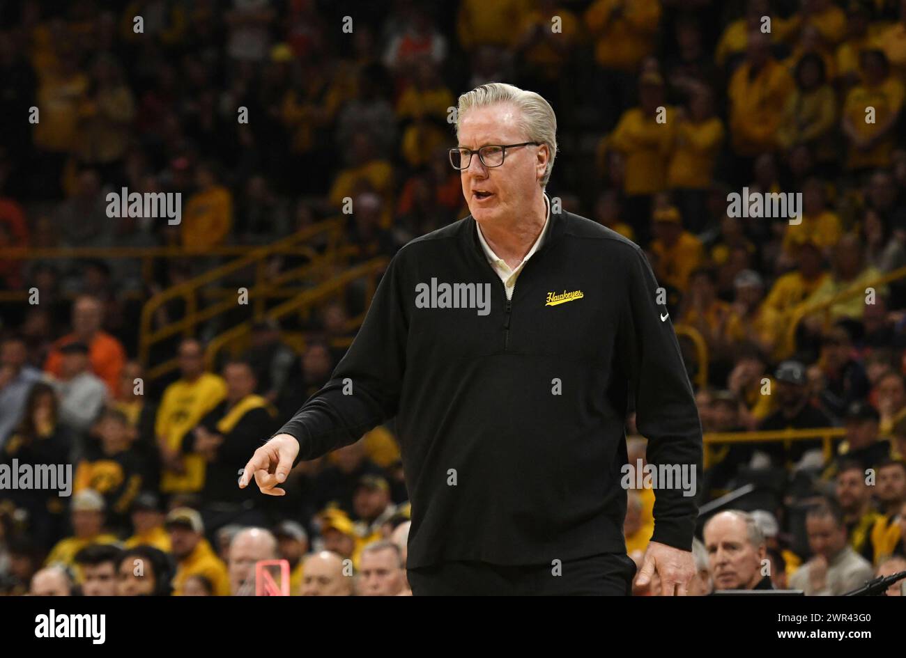 Iowa head coach Fran McCaffery speaks to an official during the first ...