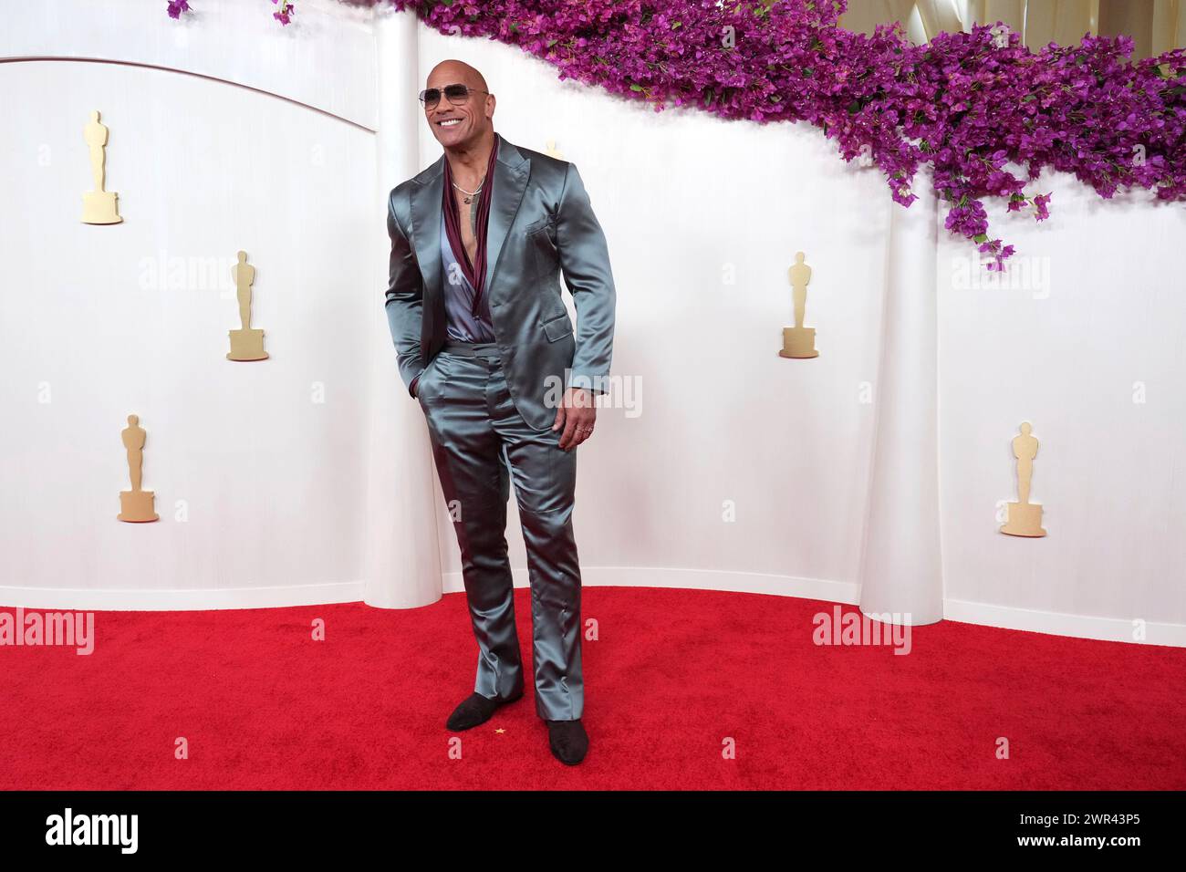 Dwayne Johnson arrives at the Oscars on Sunday, March 10, 2024, at the ...