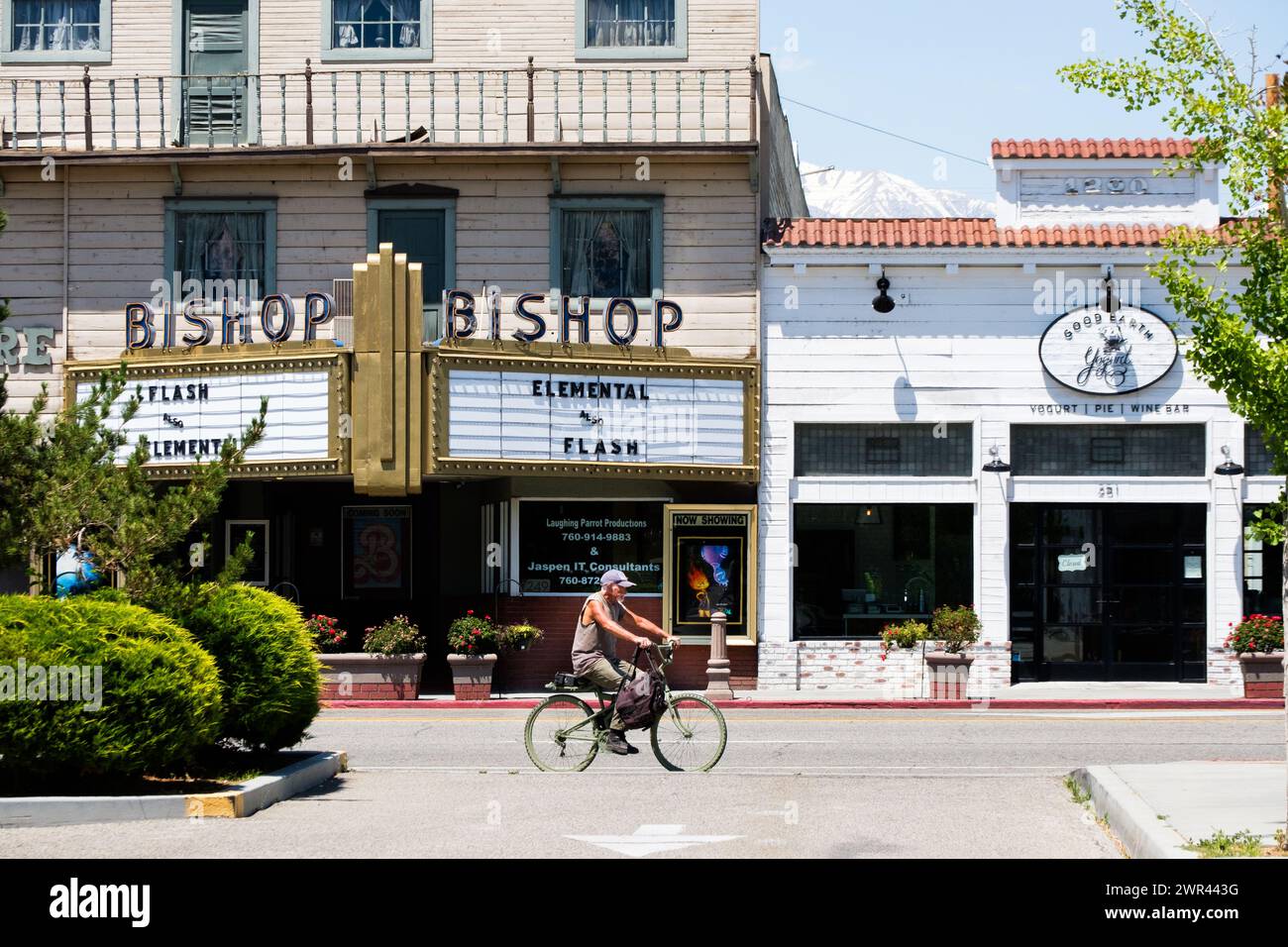 Pedestrians walk by the Bishop Theater on North Main Street in the City ...