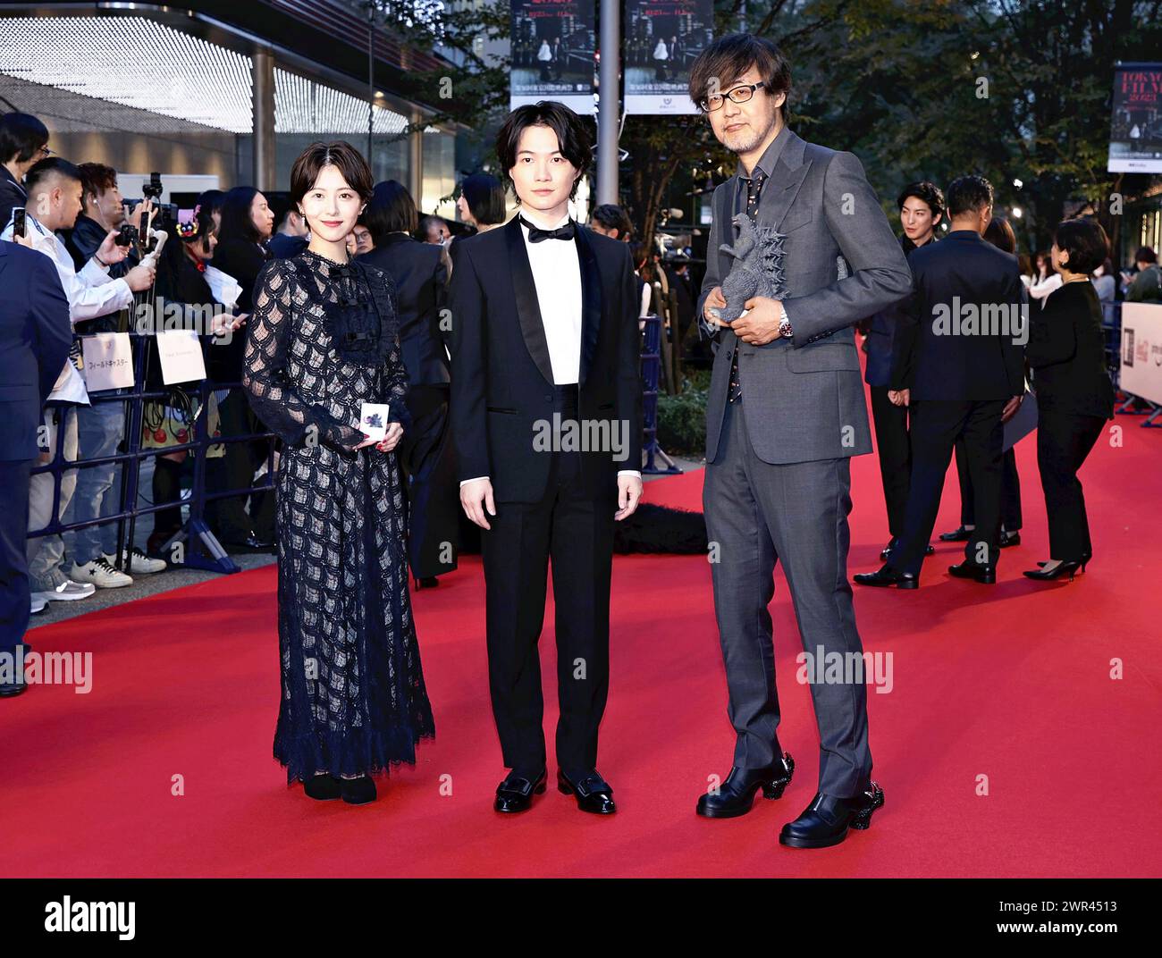 FILE: Japanese actors Minami Hamabe (L), Ryunosuke Kamiki (C), and ...