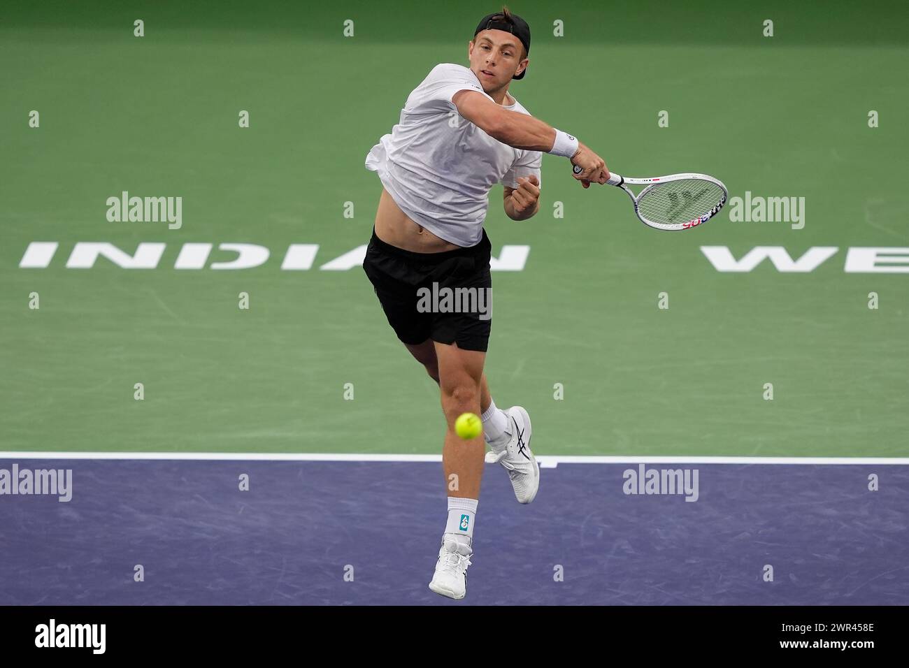 Tallon Griekspoor, of the Netherlands, returns a shot against Alexander ...