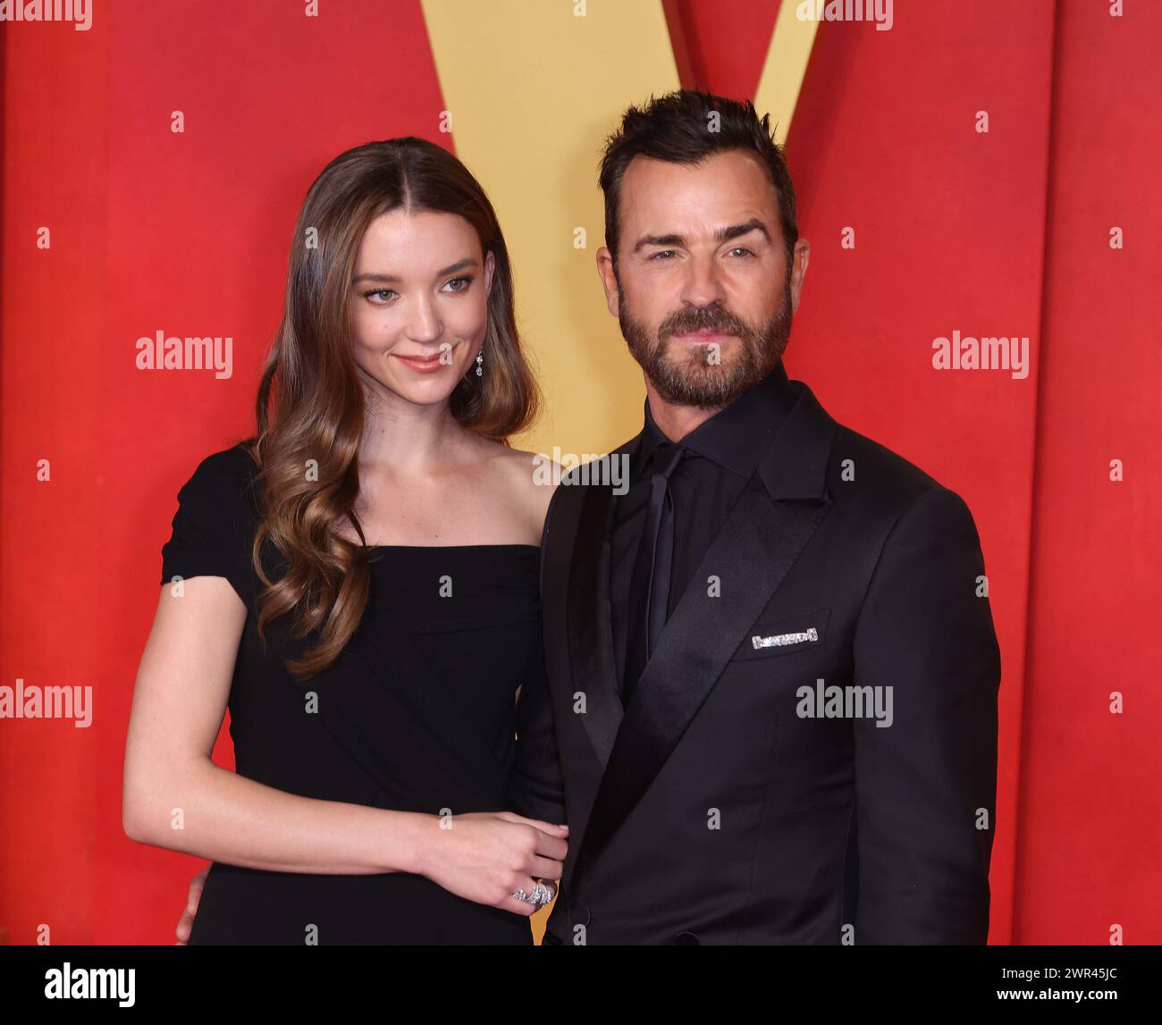 Justin Theroux, Nicole Brydon Bloom attend the 2024 Vanity Fair Oscar ...