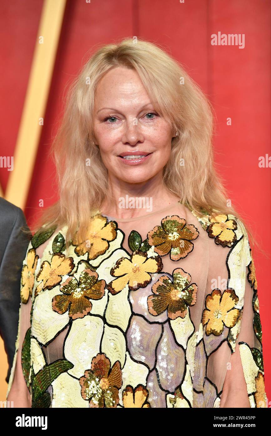 Pamela Anderson arrives at the Vanity Fair Oscar Party on Sunday, March ...