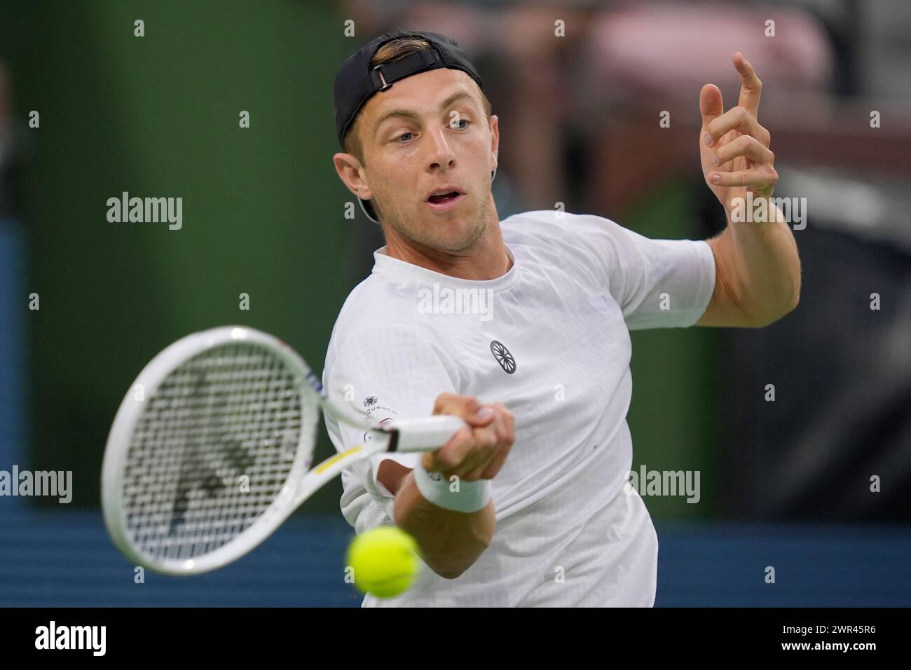 Tallon Griekspoor, of the Netherlands, returns a shot against Alexander ...