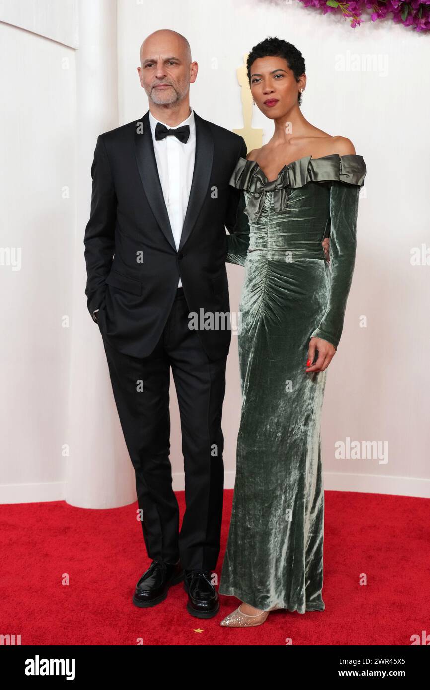 From left, James Wilson and Arielle Cooper-Lethe arrive at the Oscars ...
