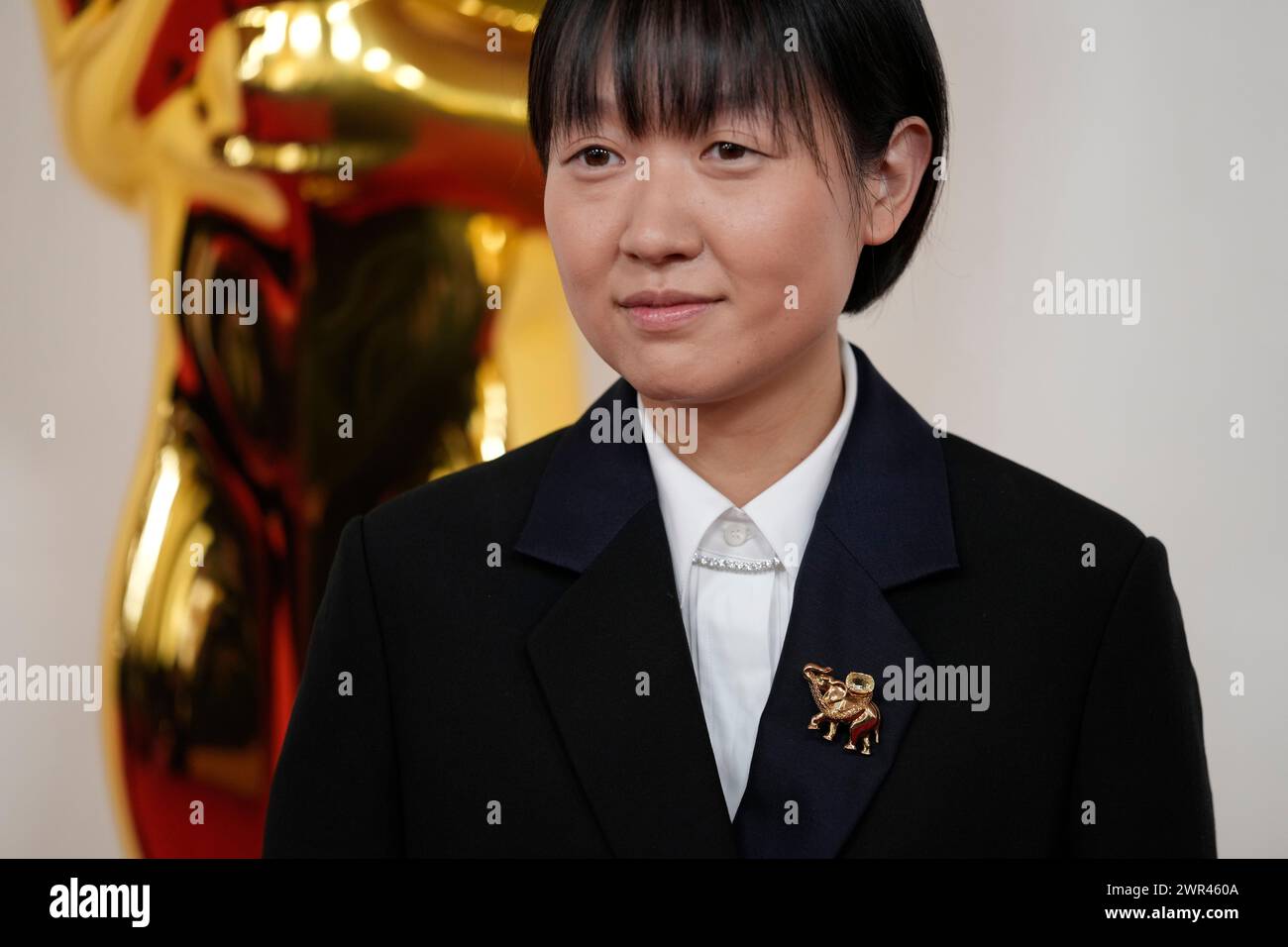 Celine Song arrives at the Oscars on Sunday, March 10, 2024, at the ...