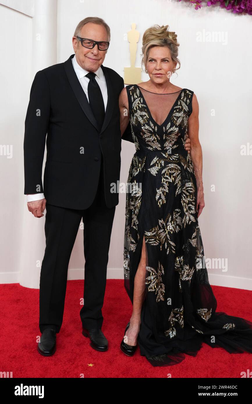 From left, Charles Roven and Stephanie Haymes arrive at the Oscars on ...