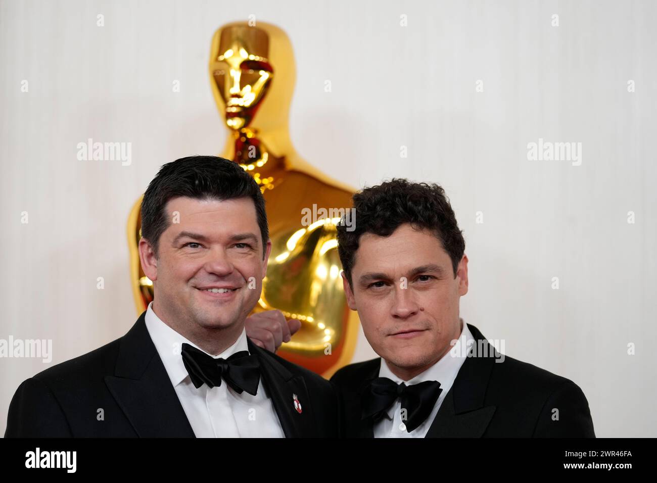 Christopher Miller, left, and Phil Lord arrive at the Oscars on Sunday ...