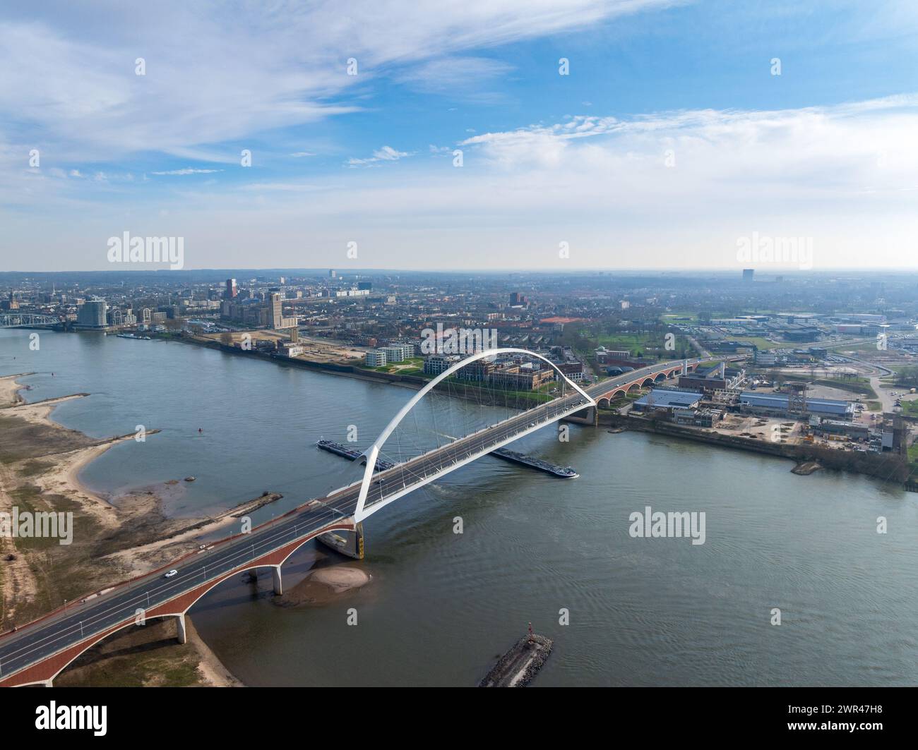 aerial view of a modern bridge called "De Oversteek" (the Crossing) in ...