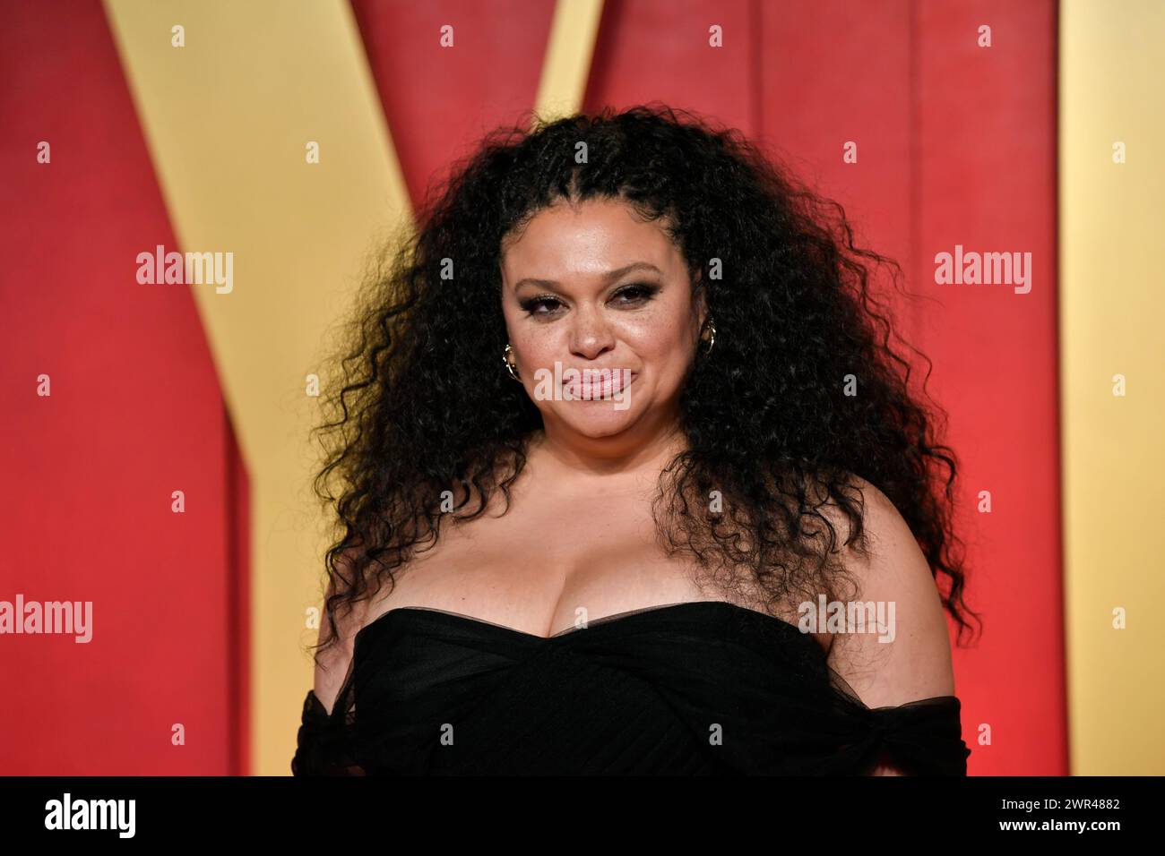 Michelle Buteau arrives at the Vanity Fair Oscar Party on Sunday, March ...