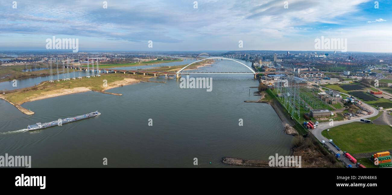 aerial view of a modern bridge called "De Oversteek" (the Crossing) in ...