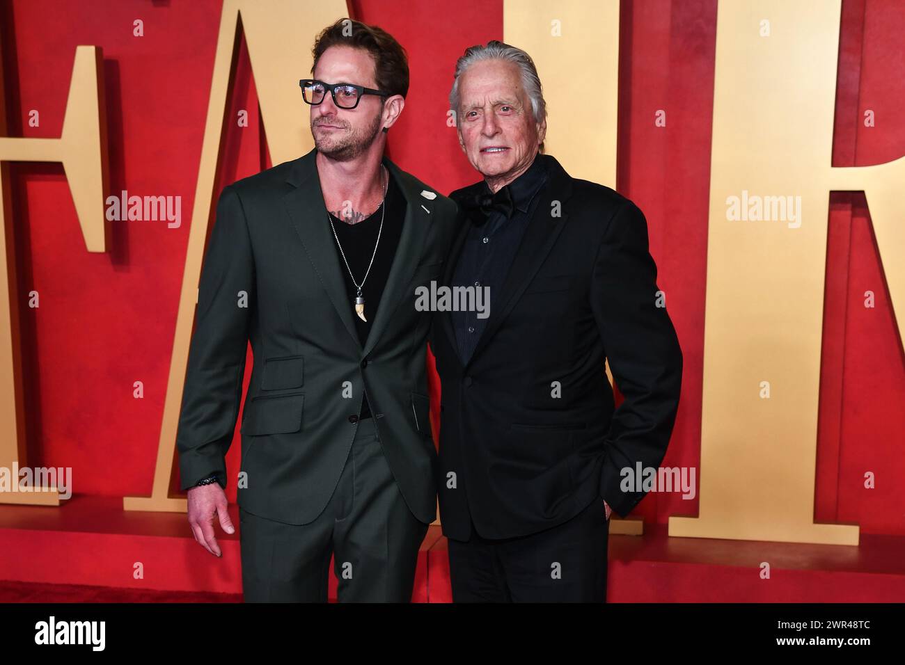 USA. 10th Mar, 2024. Cameron Douglas and Michael Douglas walking on the ...