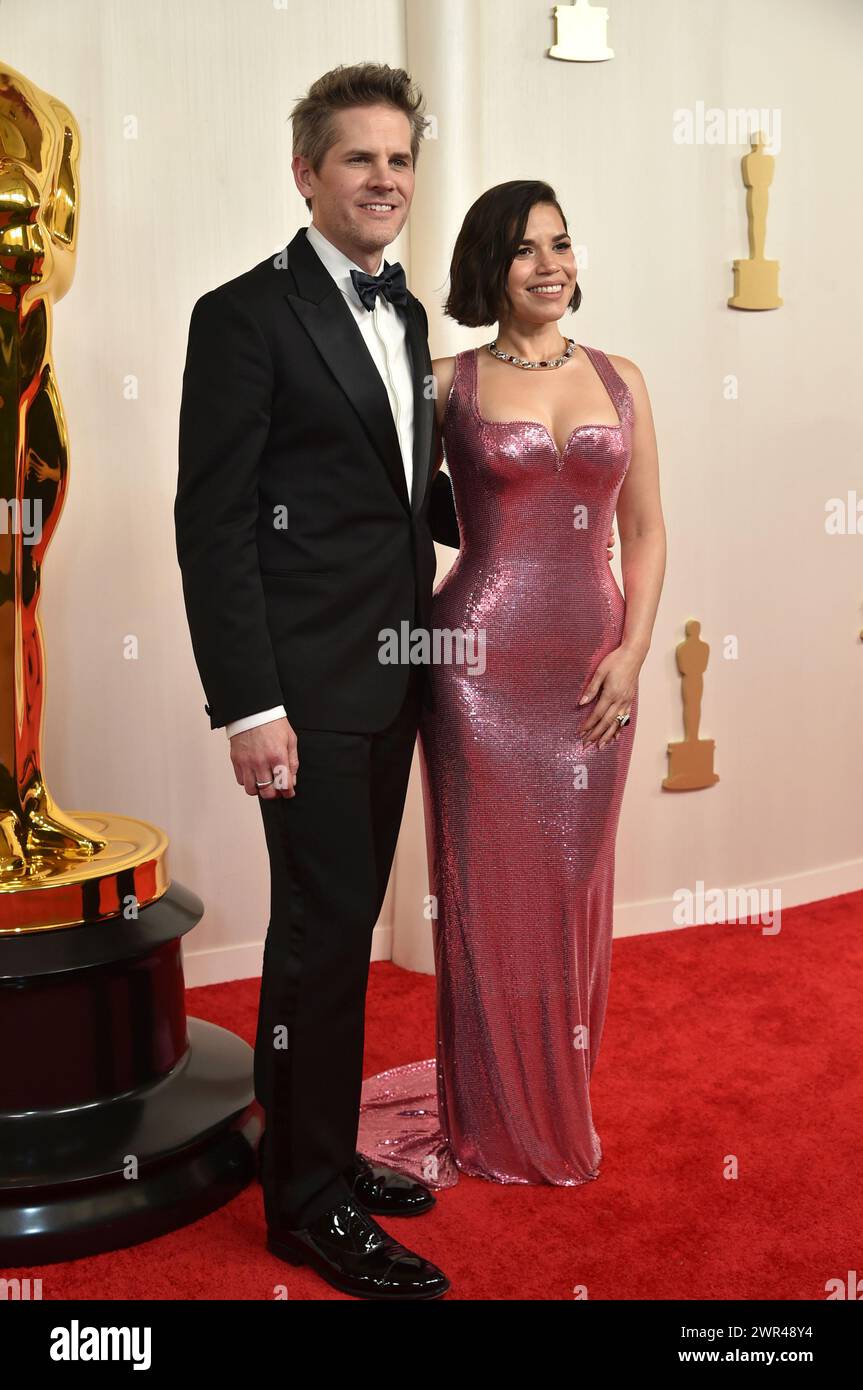 Ryan Piers Williams, left, and America Ferrera arrive at the Oscars on ...