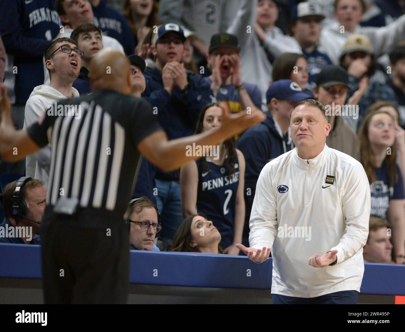 Penn State coach Mike Rhoades, right, reacts to an official's call ...