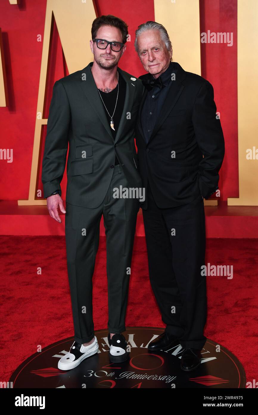 USA. 10th Mar, 2024. Cameron Douglas and Michael Douglas walking on the ...