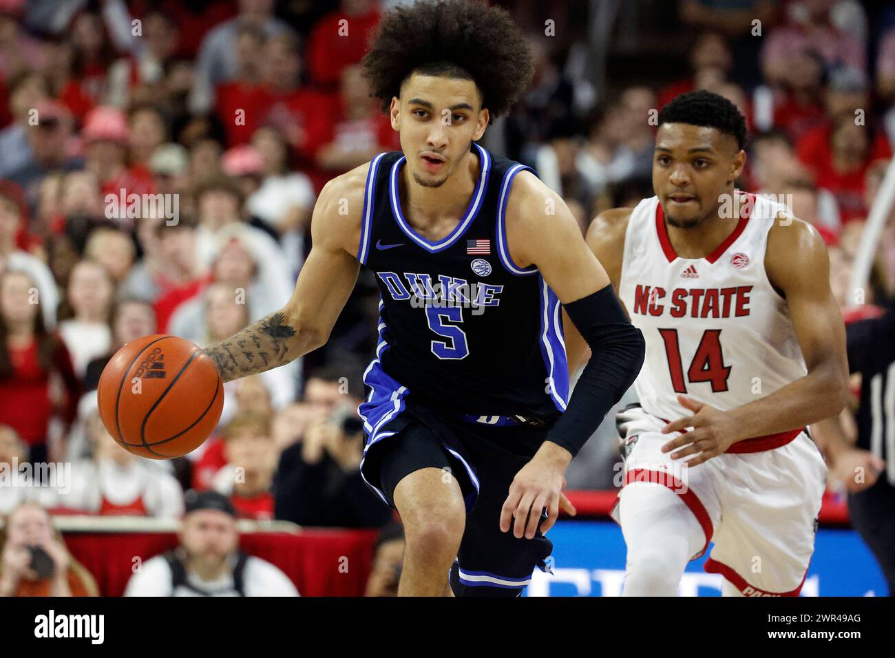 Duke's Tyrese Proctor (5) moves the ball down the court with North ...