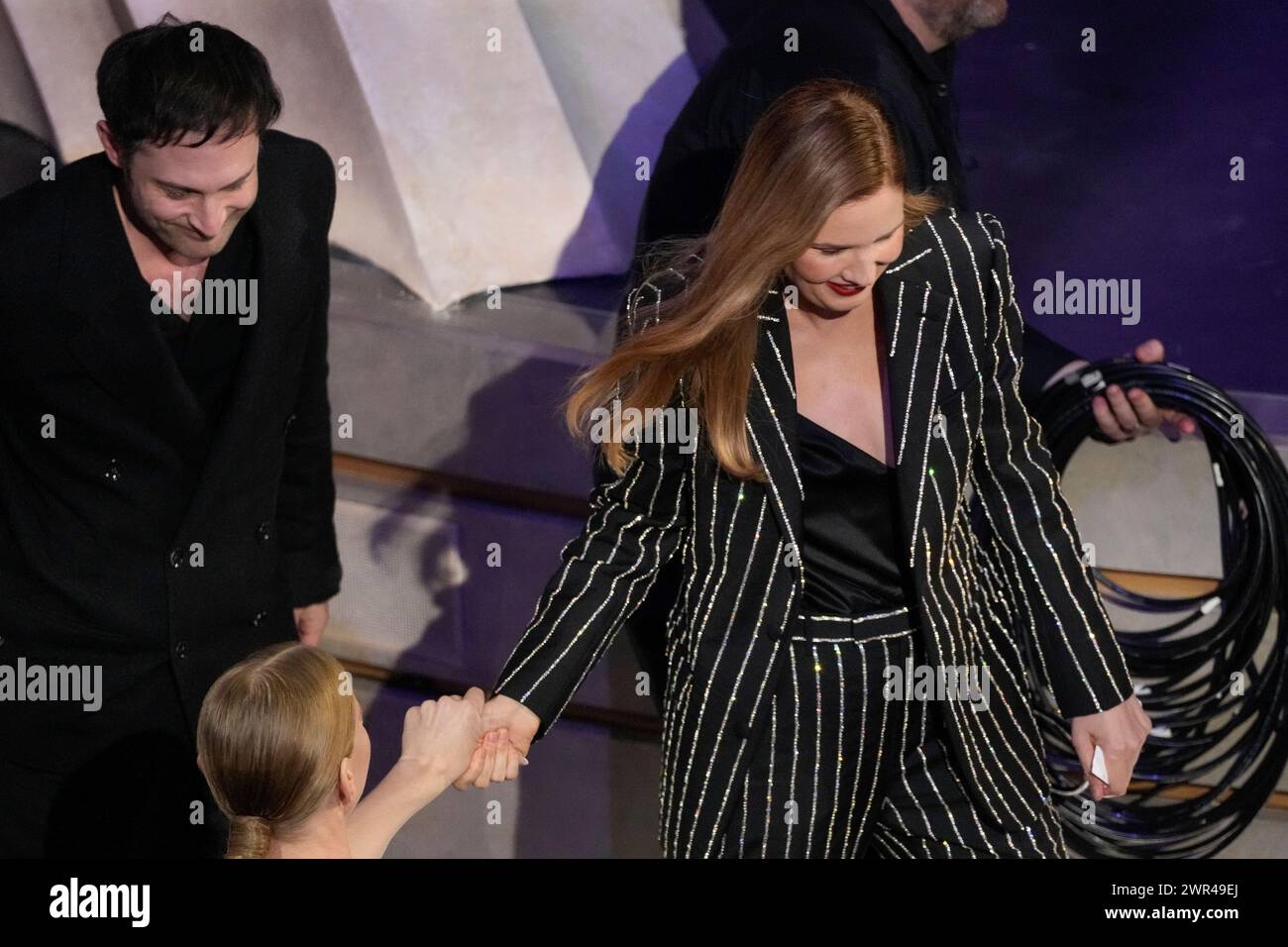 Arthur Harari, left, and Justine Triet accept the award for best ...