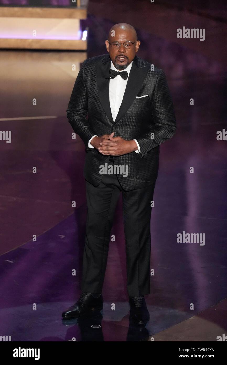 Forest Whitaker presents the award for best performance by an actor in ...