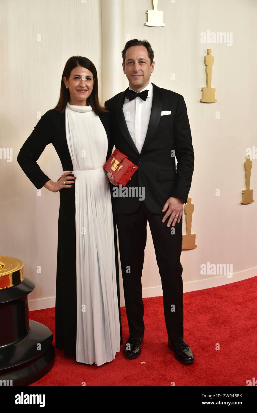 Jamie Kantrowitz, left, David Greenbaum arrive at the Oscars on Sunday ...