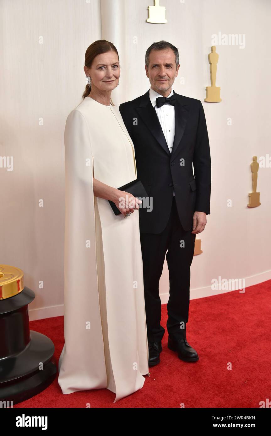 Rose Uniacke, left, and David Heyman arrive at the Oscars on Sunday ...