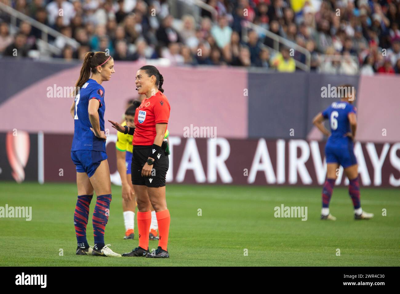 SAN DIEGO, CA - MARCH 10: United States forward Alex Morgan (7) gets a ...