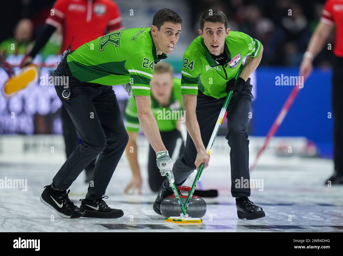 Regina, Canada. 10th Mar, 2024. Saskatchewan lead Daniel Marsh, left, and second Kevin Marsh ...