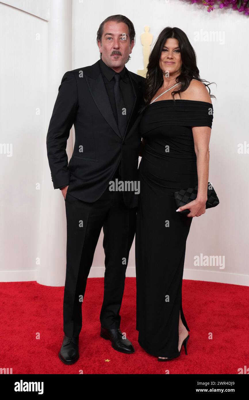 Michael Merriman, left, and Robbie Brenner arrive at the Oscars on ...