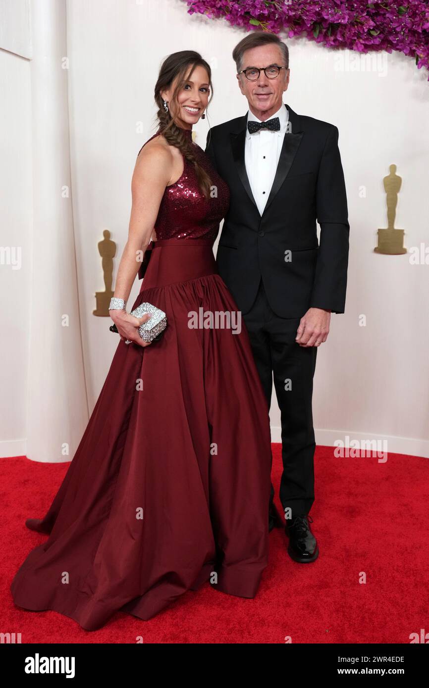 Angie Katsanevas, from left and Kevin O'Connell arrive at the Oscars on ...