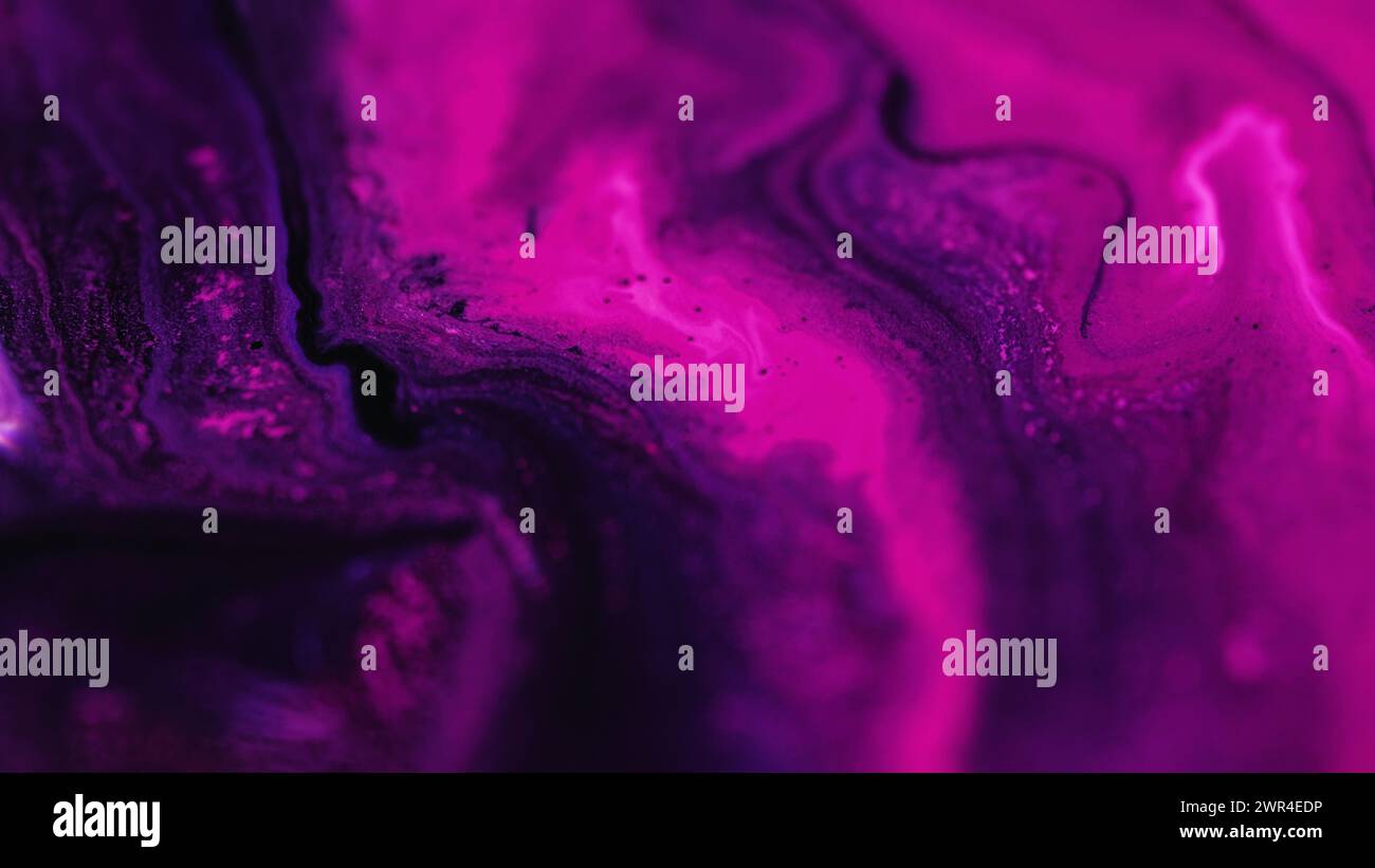 Paint mix neon background pink purple ink blend Stock Photo - Alamy