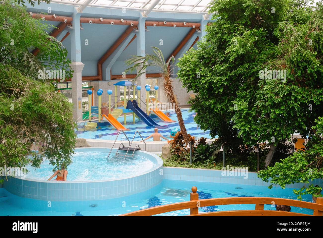 Water fountain in aquapark. Mushroom shape fountain in indoor adventure ...