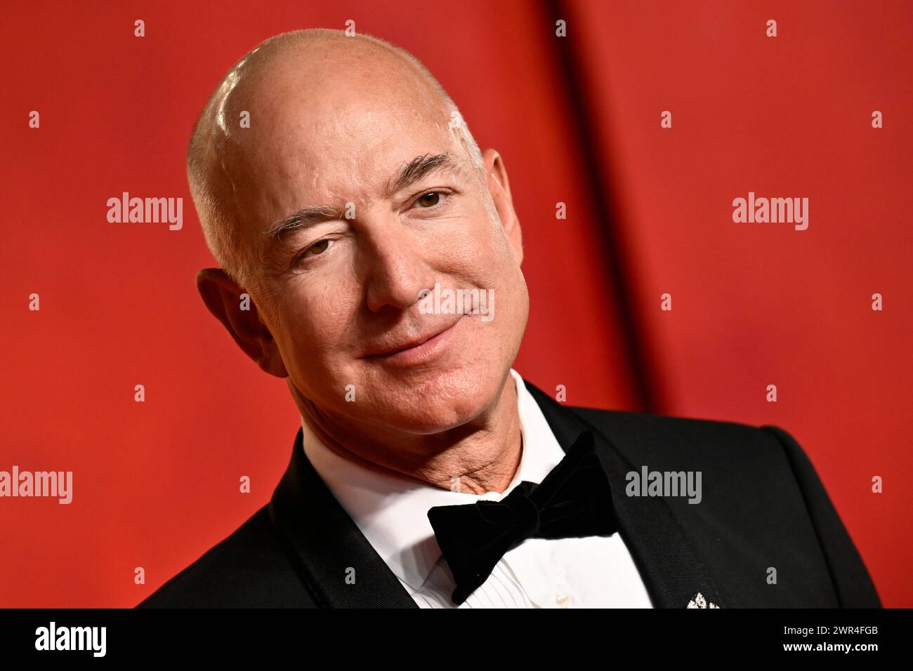 Jeff Bezos arrives at the Vanity Fair Oscar Party on Sunday, March 10 ...