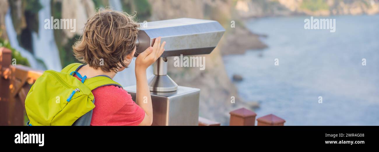 BANNER, LONG FORMAT Boy tourist with a backpack on the background of ...
