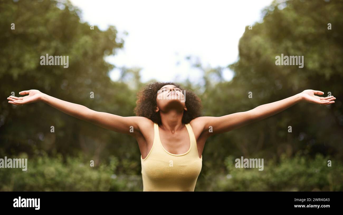 Relax, open arms and black woman in park for freedom, adventure and ...