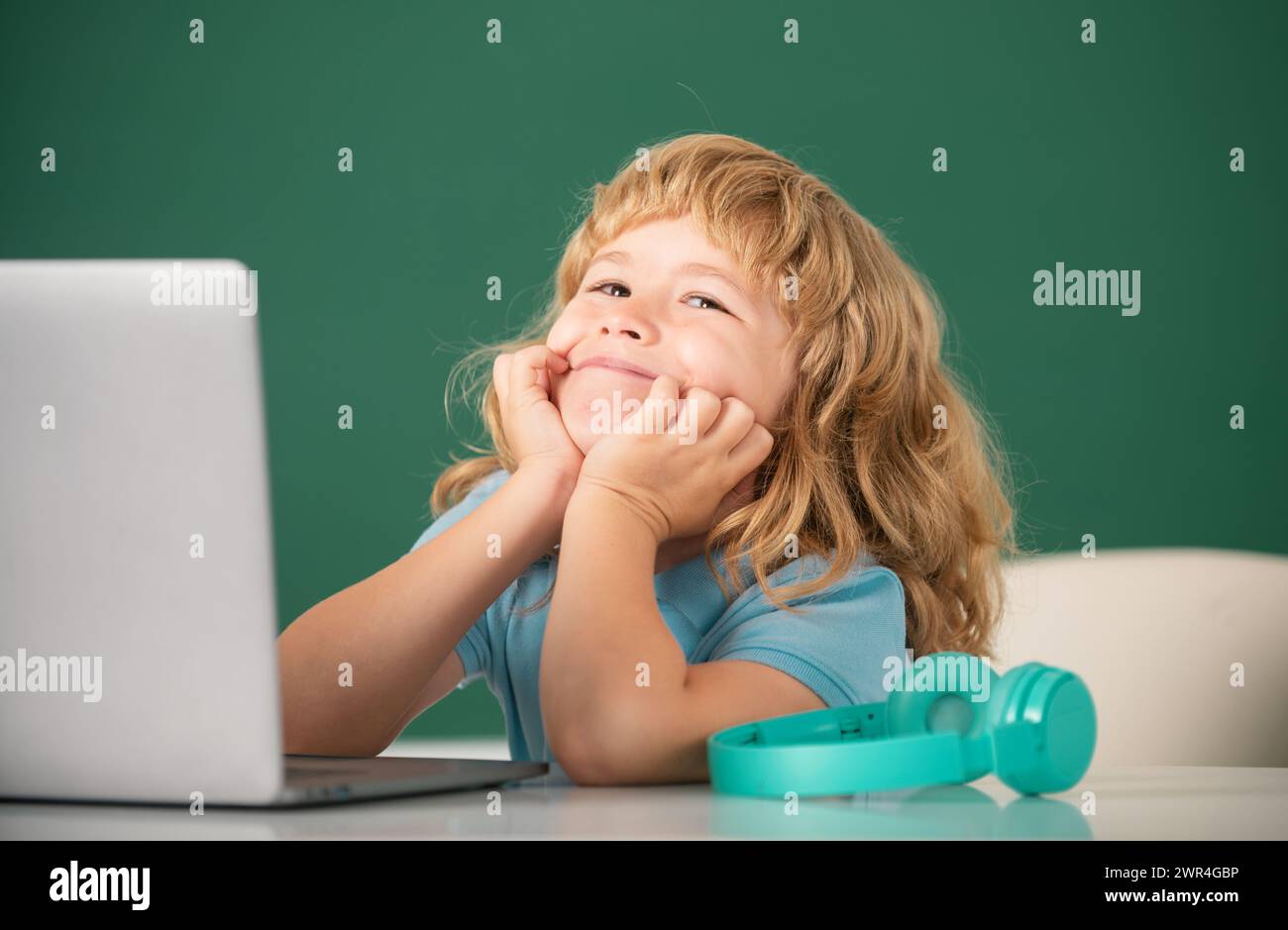 School boy dreaming on lesson in class at school. Education and ...