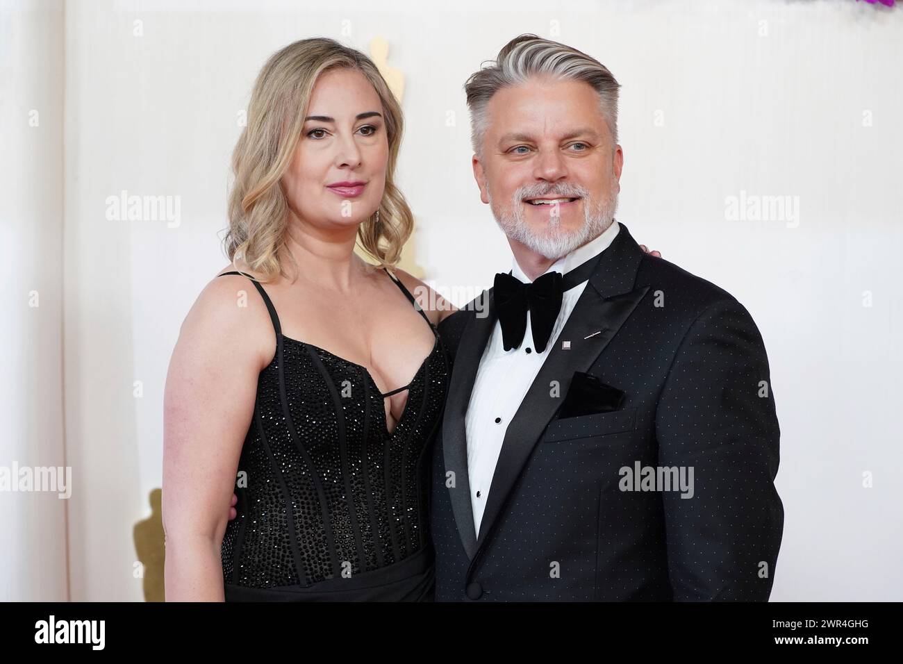 Brad Booker arrives at the Oscars on Sunday, March 10, 2024, at the ...