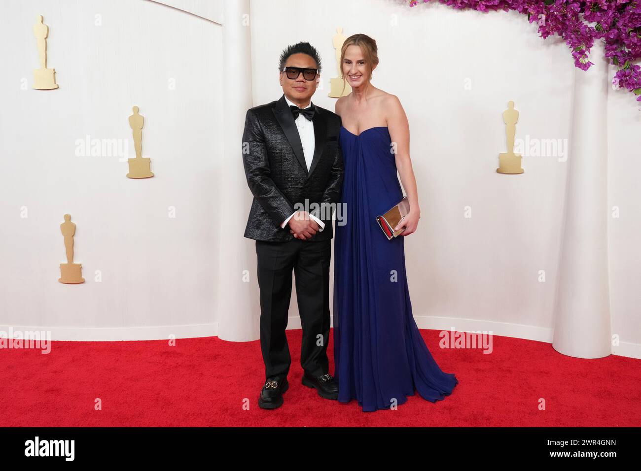 Matthew Libatique, left, and Mary Ellen Libatique arrive at the Oscars ...