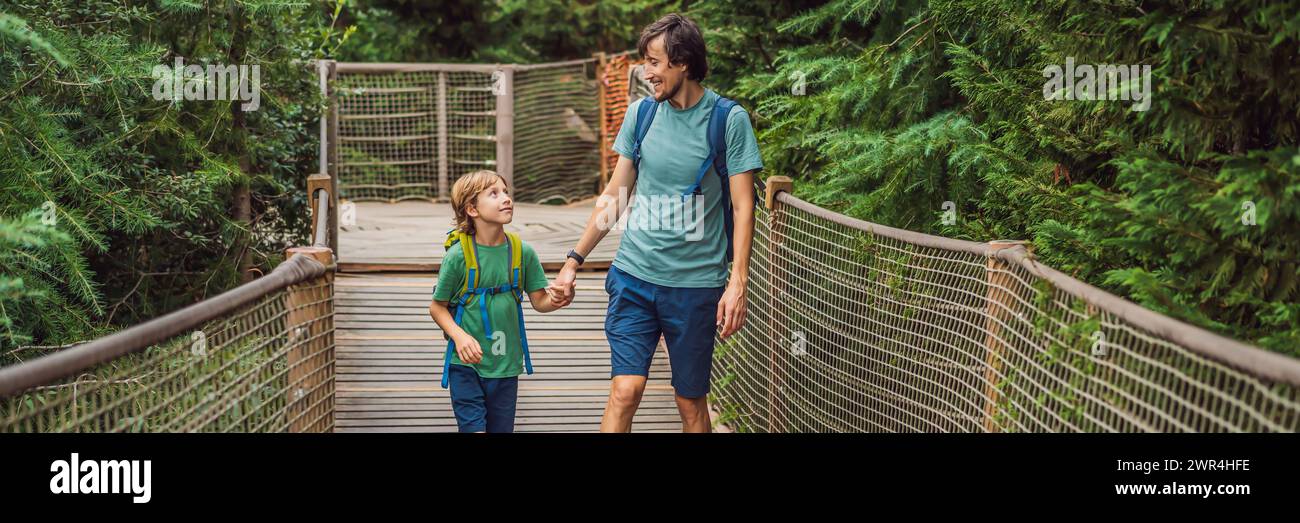 father and son tourists in Rope bridge in Yildiz Park. Besiktas ...