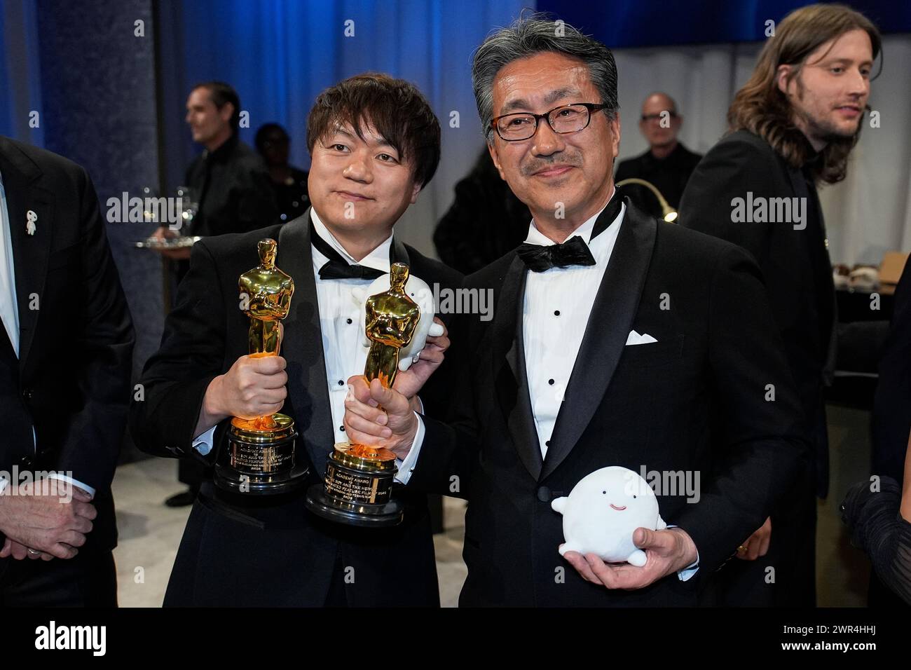 Kenichi Yoda, left, and Kiyofumi Nakajima pose with the awards for best ...