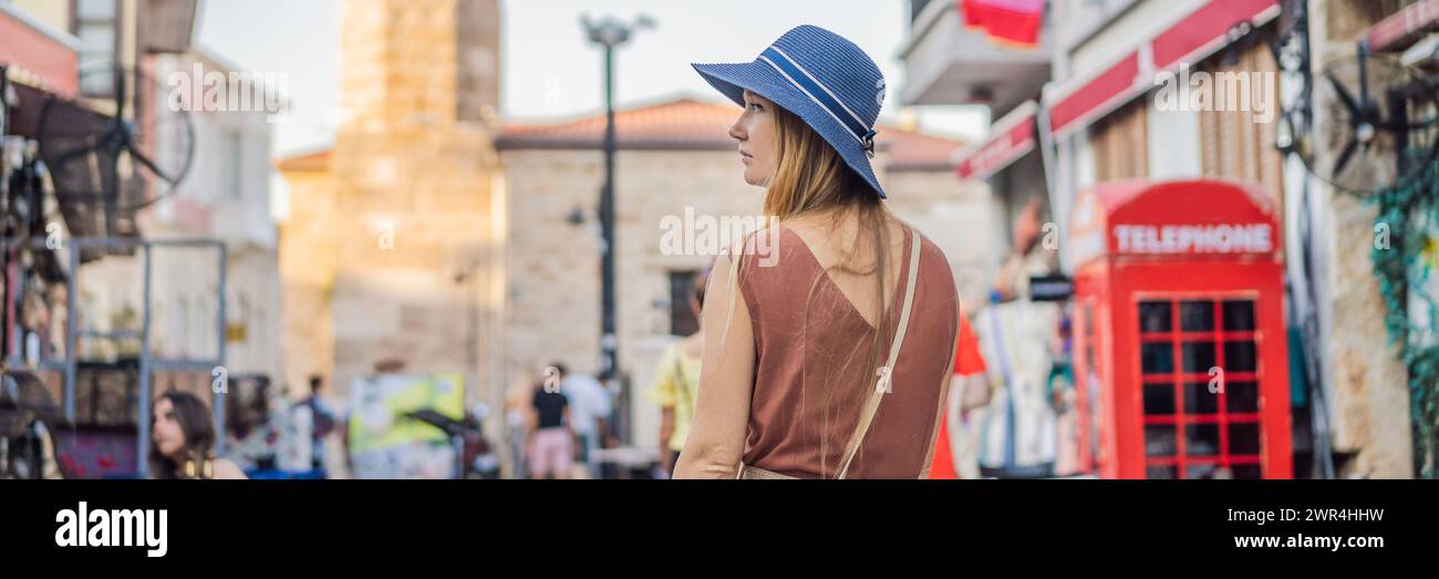 BANNER, LONG FORMAT Happy woman tourist on background of old street of ...