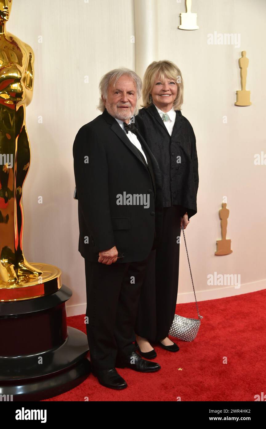 Sid Ganis, left, and Nancy Hult Ganis arrive at the Oscars on Sunday ...