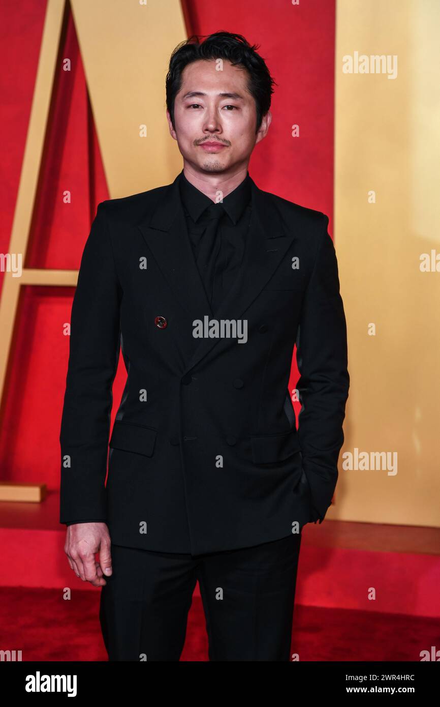 USA. 10th Mar, 2024. Steven Yeun walking on the red carpet at the 2024 ...