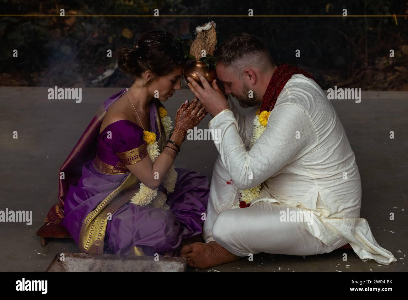 Wedding of a couple from Europe in India. light skinned man in a ...