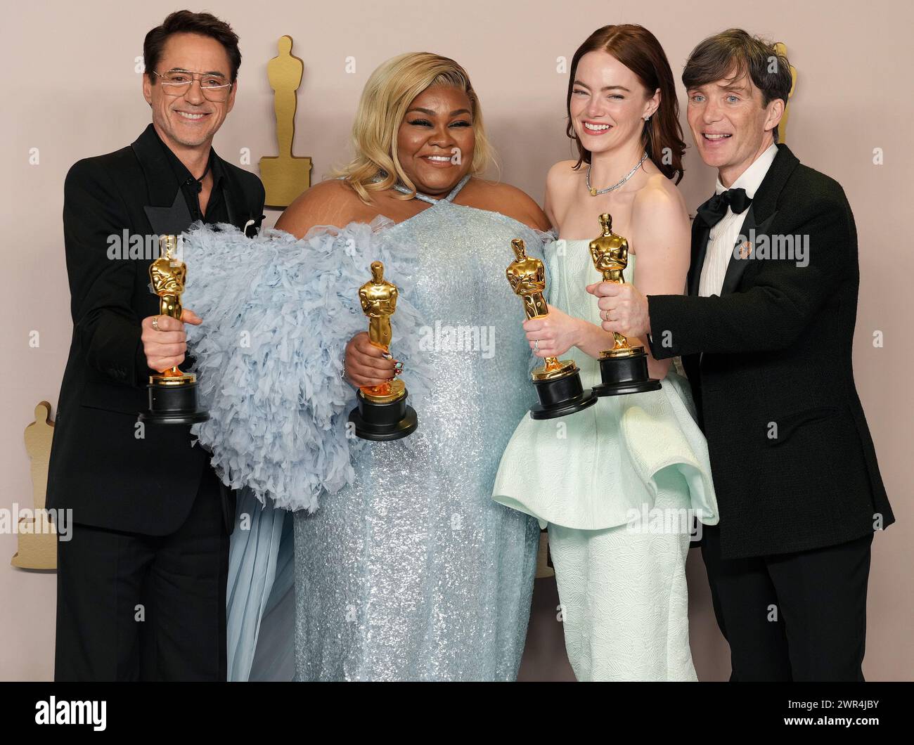 (L-R) Robert Downey Jr., winner of the Best Supporting Actor award for ...