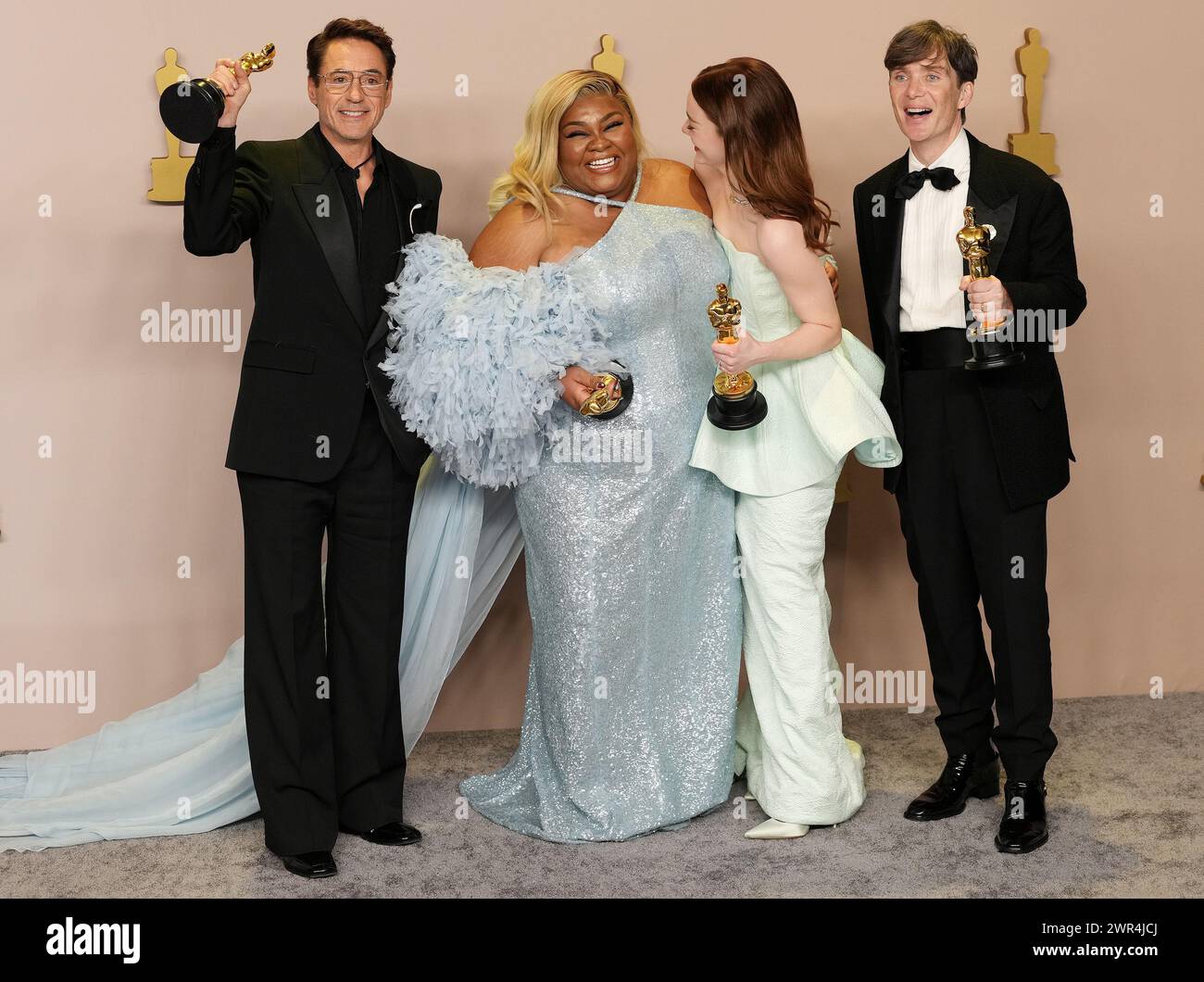 (L-R) Robert Downey Jr., winner of the Best Supporting Actor award for ...