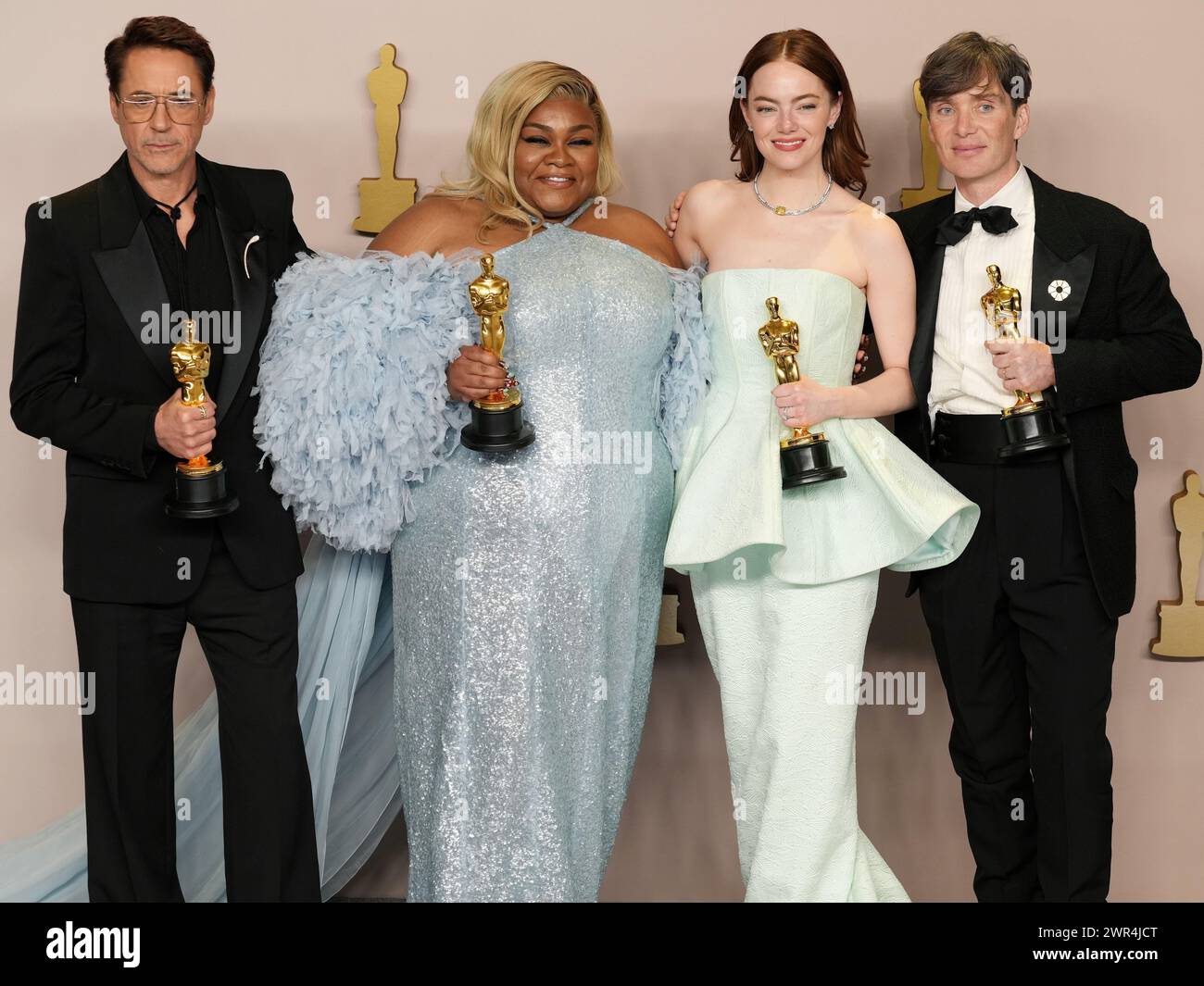 (L-R) Robert Downey Jr., winner of the Best Supporting Actor award for ...