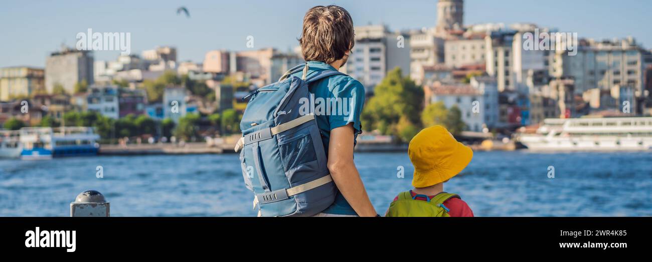 Father and son tourists enjoy Istanbul city skyline in Turkey, Beyoglu ...